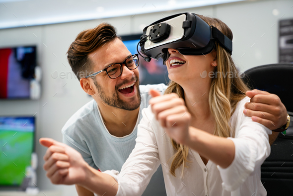 Group of people using virtual reality headset at exhibition, show. VR ...