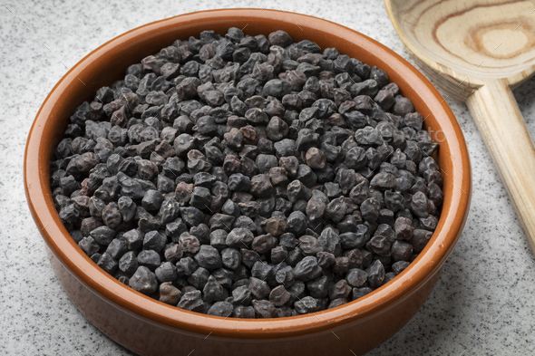 Bowl with black chickpea Murgia, ceci nero, also known by the name of ...