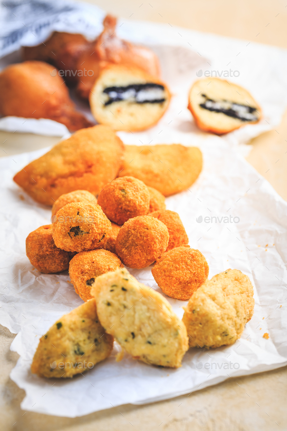 Finger food and street food - assortment of Arancini rice balls, fried ...