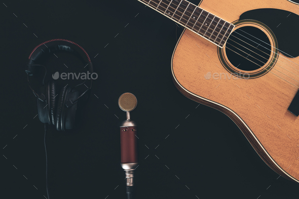 Flat lay, music background with acoustic guitar. Stock Photo by puhimec