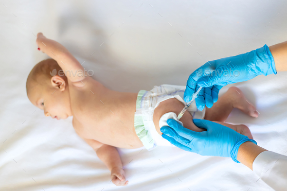 Vaccination baby, injection in the leg. Selective focus. Stock Photo by ...