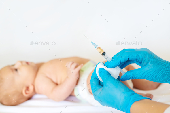 Vaccination baby, injection in the leg. Selective focus. Stock Photo by ...