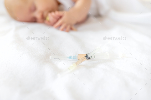 Vaccination baby, injection in the arm. Selective focus. Stock Photo by ...