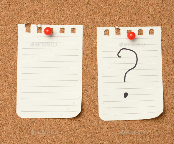 White sheet of paper with a question mark attached with red buttons to ...