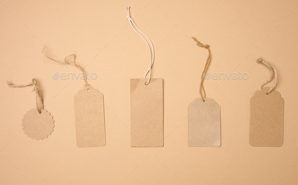 Blank brown rectangular, round brown paper tag on a rope Stock Photo by ...