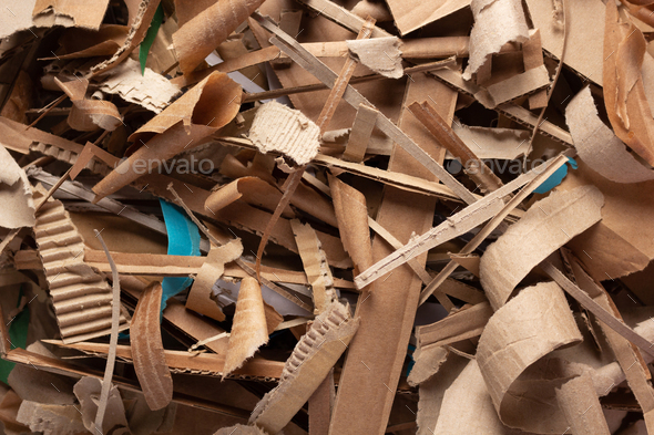 Waste paper as background texture. Recycling brown cardboard heap Stock ...