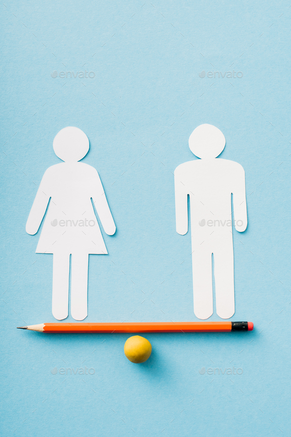 paper figures of couple as gender equality on pencil with ball isolated ...