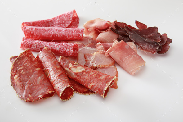 fresh delicious assorted sliced meat isolated on white Stock Photo by ...