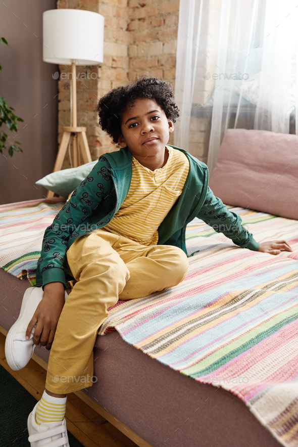 African little boy resting on sofa Stock Photo by AnnaStills | PhotoDune