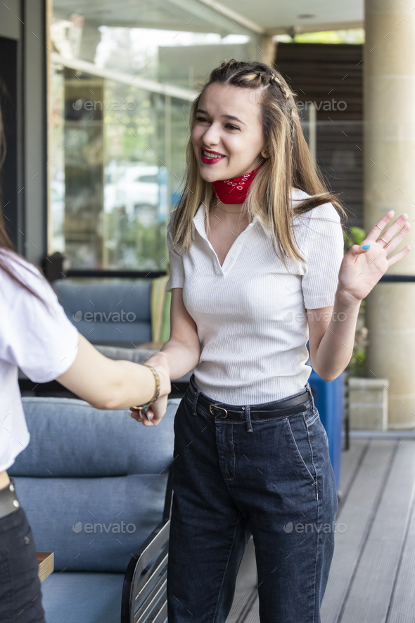 Young girl holding someone's hand and talking Stock Photo by 13people
