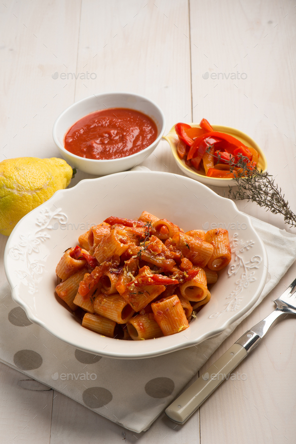 pasta with capsicum thymus and grated lemon peel Stock Photo by MarcoMayer