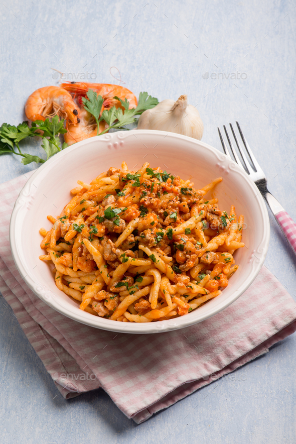 trofie pasta with shrimp tomatoes garlic and parsley Stock Photo by ...