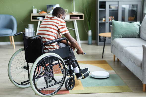 Man with Disability using Accessible Smart Technology Stock Photo by ...
