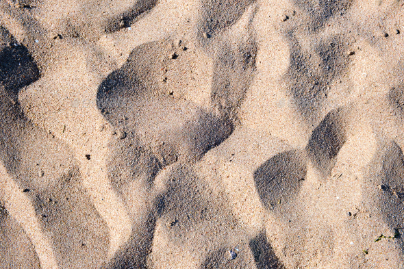 Flat view of clean yellow sand surface covering seaside beach. Sandy ...
