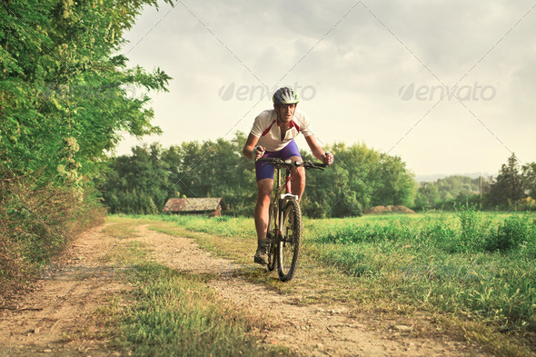 Cycle in the country Stock Photo by ollyi | PhotoDune