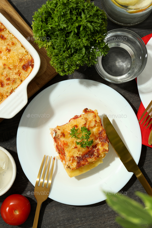 Concept of delicious food, lasagna, top view Stock Photo by AtlasComposer