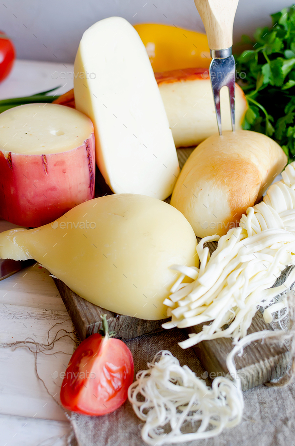 Assorted cheeses Pasta filata {Provolone) in various shapes and sizes ...