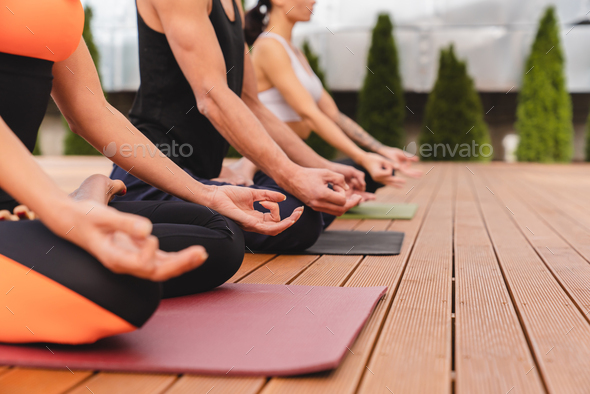 Close up photo of hands position while meditation in the garden Stock ...
