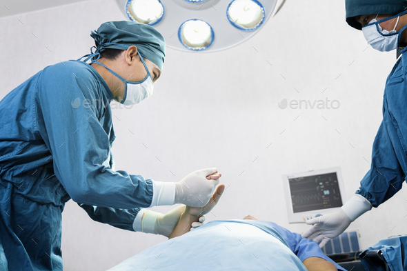 The surgeon encouraged the patient after the surgery was completed ...