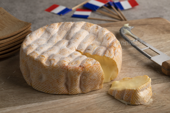 Aged French soft cheese with orange washed rind from the Vosges ...