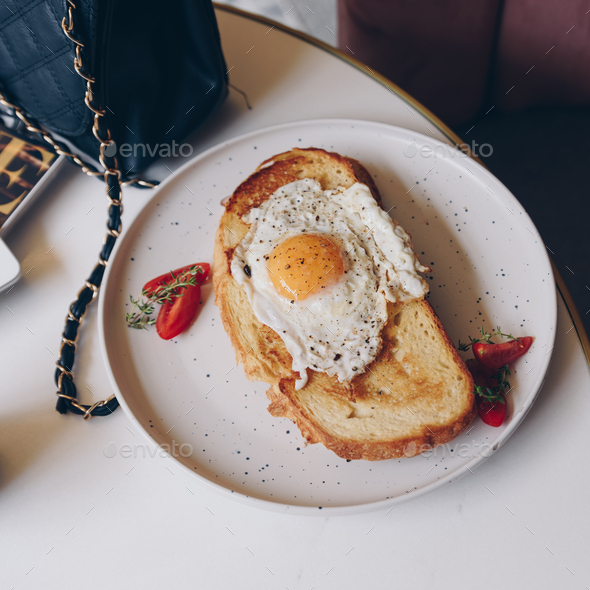 Croque madame, french toast with poached egg, ham and cheese Stock ...