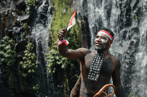 Indonesian black tribe man Stock Photo by Garakta-Studio | PhotoDune