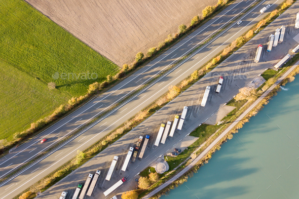 Top down aerial view of highway interstate road with fast moving ...