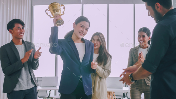 An employee of the company is proud to receive an award for a ...