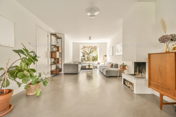 Spacious modern room with lounge and dining areas Stock Photo by pro ...