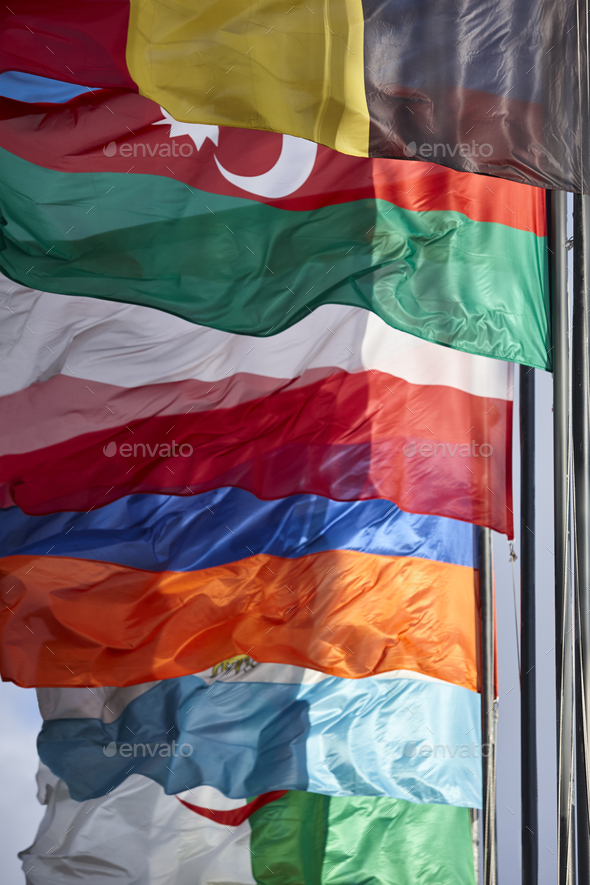 Flags of the word waving in the wind. Nation emblems Stock Photo by ...
