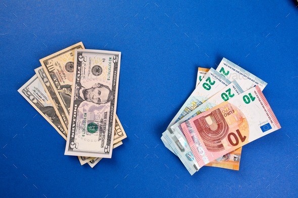 Flat lay of banknotes of money dollars and euro, exchange rate Stock ...
