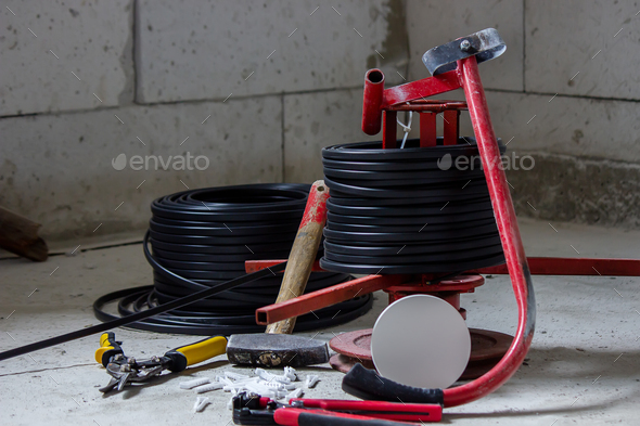 Electrical wiring in the house. Electric cable laying. Stock Photo by ...