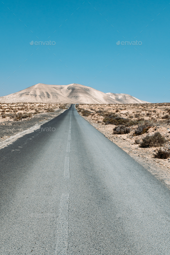 Empty roadway in dry terrain Stock Photo by davidpradoperucha | PhotoDune