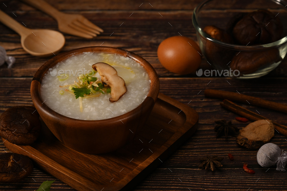 Delicious the traditional Chinese breakfast, rice porridge with soft ...