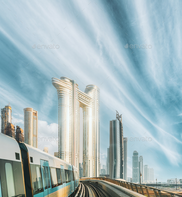 Monorail Subway train rides among glass skyscrapers Stock Photo by ...