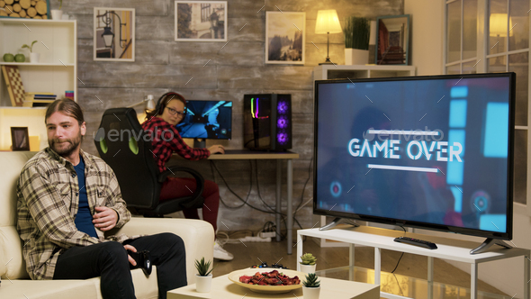 Game over for a young playing video games with vr headset Stock Photo ...