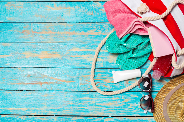 Summer holiday background with beach items Stock Photo by FabrikaPhoto