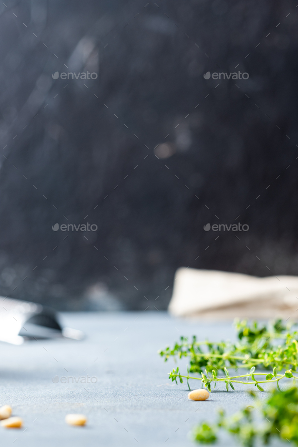 Herbs on kitchen table, food product placement background Stock Photo ...