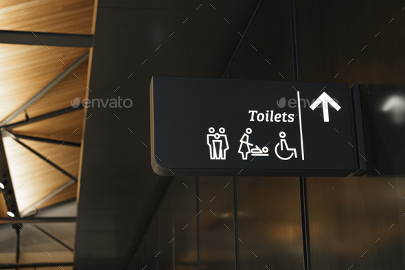 Modern public toilet sign on the wall Stock Photo by FabrikaPhoto ...