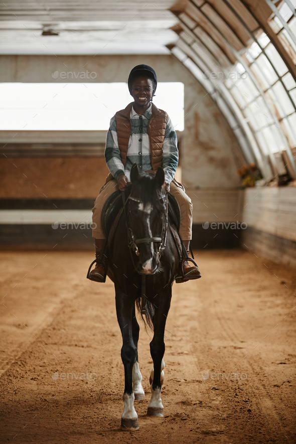 Black Young Woman Riding Horse Stock Photo by seventyfourimages | PhotoDune