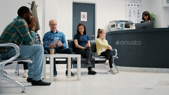 Many patients sitting in waiting area lobby at hospital reception Stock ...
