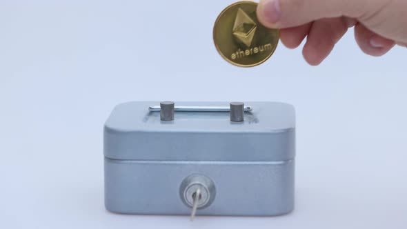 Little Saving Vault Hand Holds Golden Ethereum ETH Coin Virtual Money ...