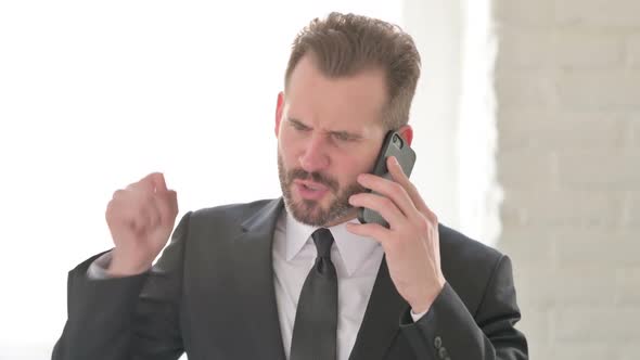 Young Businessman Talking Angrily on Smartphone, Stock Footage | VideoHive