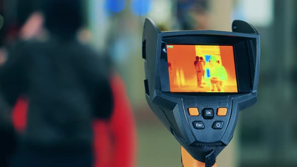 Thermographic Camera Showing People Through Infrared Light, Stock Footage