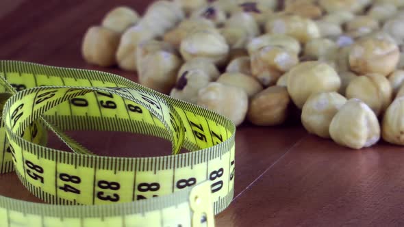 Roasted Hazelnut With Tape Measurement Turning 6, Stock Footage | VideoHive