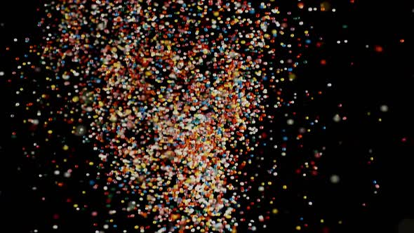 Multi Colored Particles Fly After Being Exploded, Colorful Rainbow ...