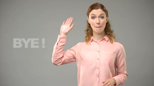 Female Saying Bye in Sign Language, Text on Background, Communication ...