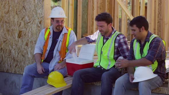 Group of construction workers taking a break, Stock Footage | VideoHive