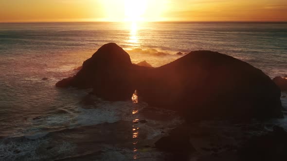 Cinematic Golden Sunset Over Still Ocean Water Natural Arch Coast ...