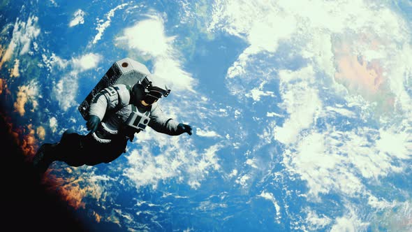 Astronaut in Outer Space Over the Planet Earth, Motion Graphics | VideoHive